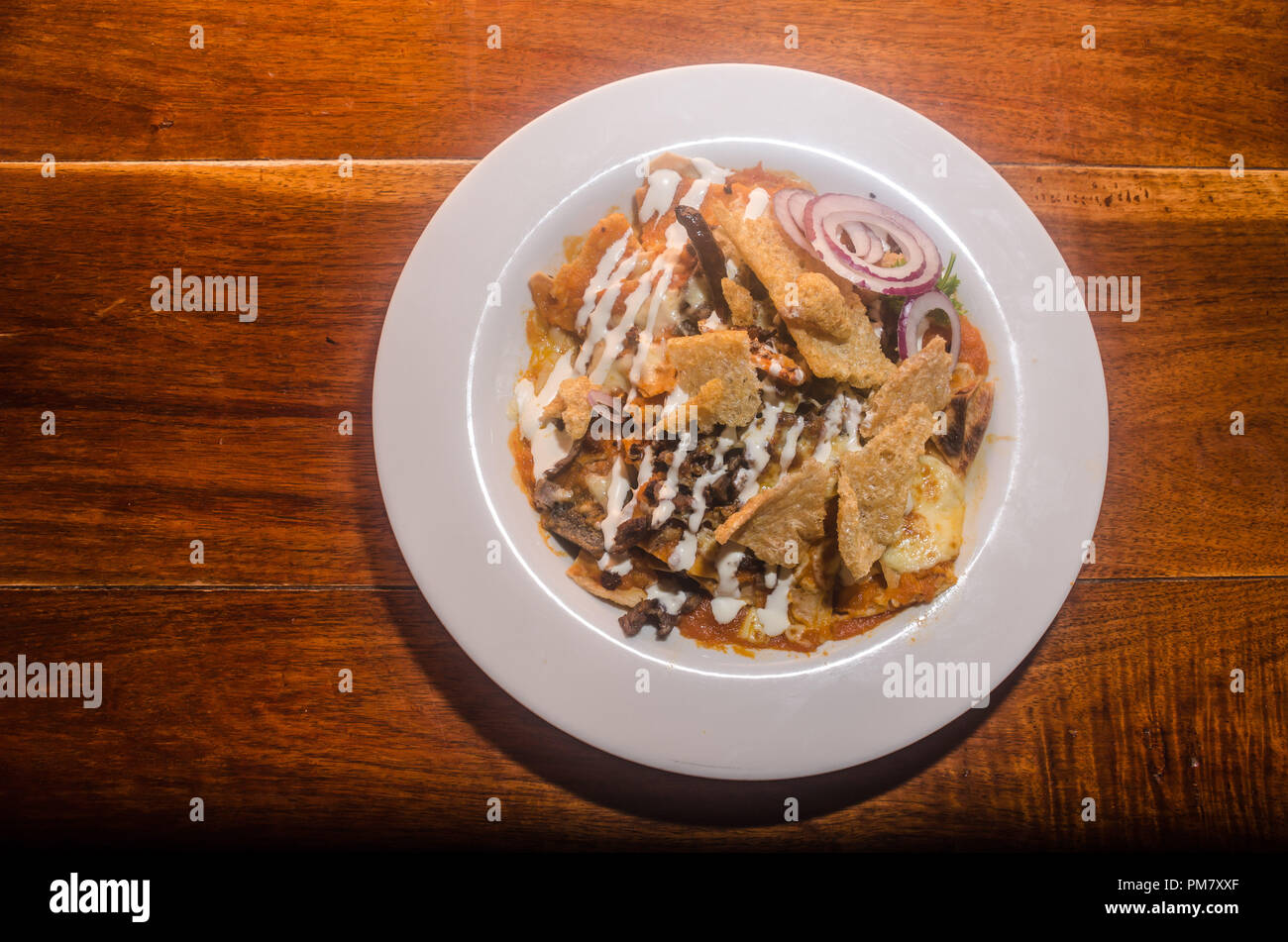 Classic mexican dish with tortilla, beef and chicharron Stock Photo - Alamy