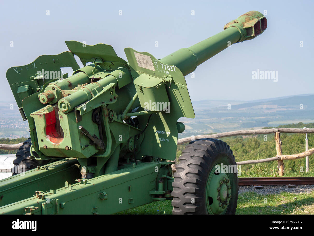Cannon gun military vehicle with landscape background Stock Photo - Alamy