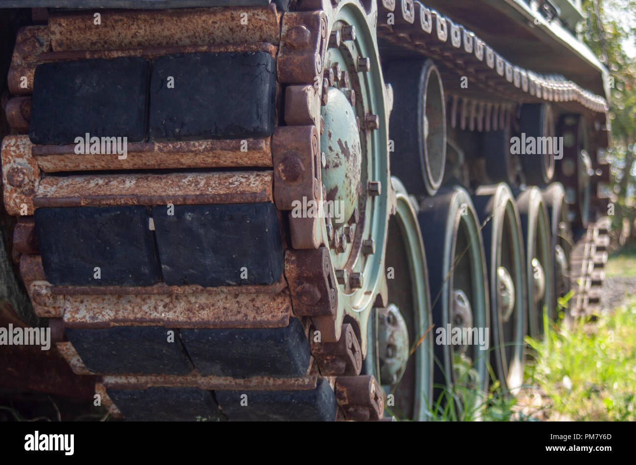Tank tracks military vehicle with landscape background Stock Photo - Alamy