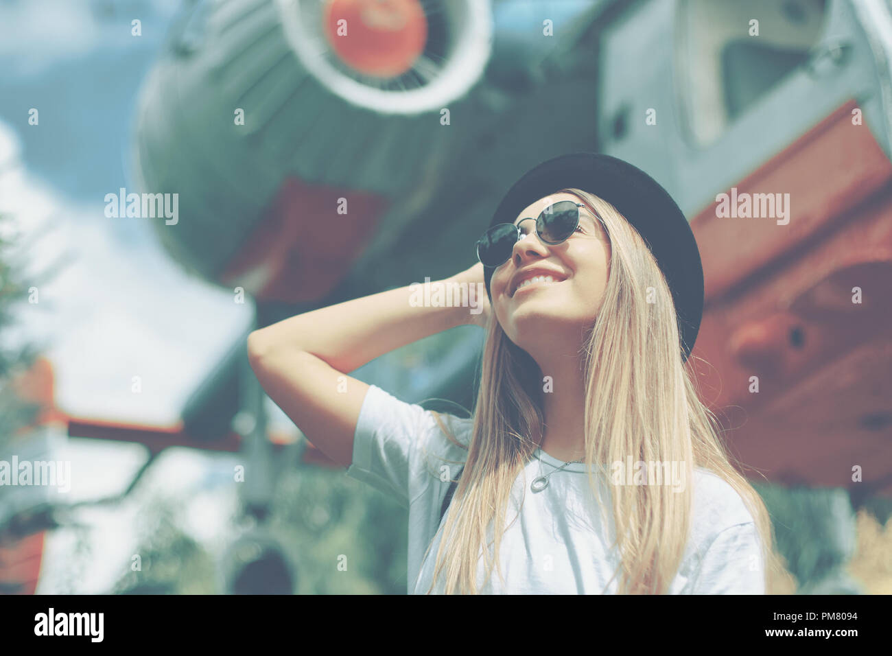 Sunny, carefree girl portrait, enjoying a beautiful day, with blurred ...