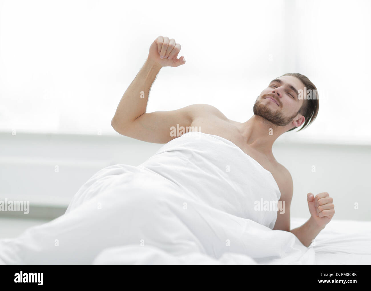 happy man waking up in the morning Stock Photo - Alamy