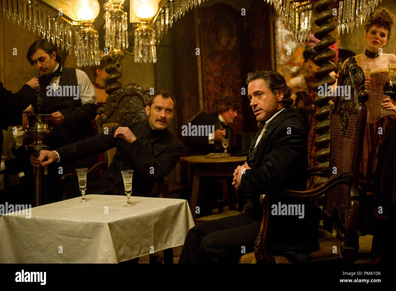 (Center l-r) JUDE LAW as Dr. James Watson and ROBERT DOWNEY JR. as ...