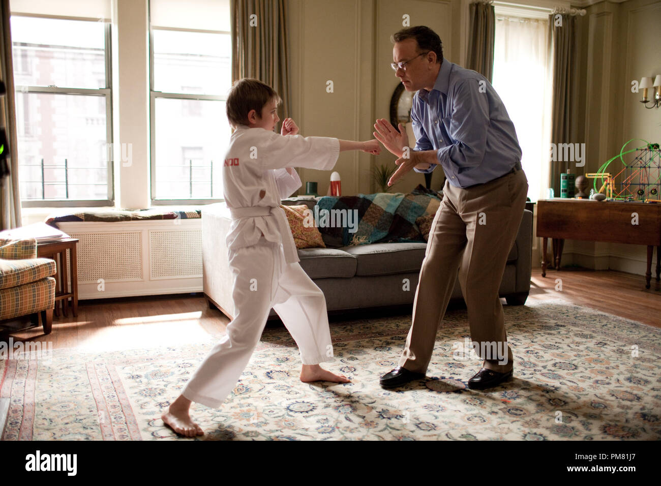(L-r) THOMAS HORN as Oskar Schell and TOM HANKS as Thomas Schell in ...