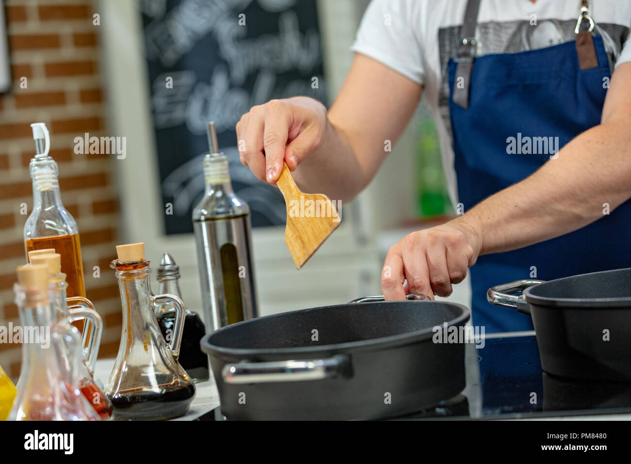 Chef using spatula frying hi-res stock photography and images - Alamy