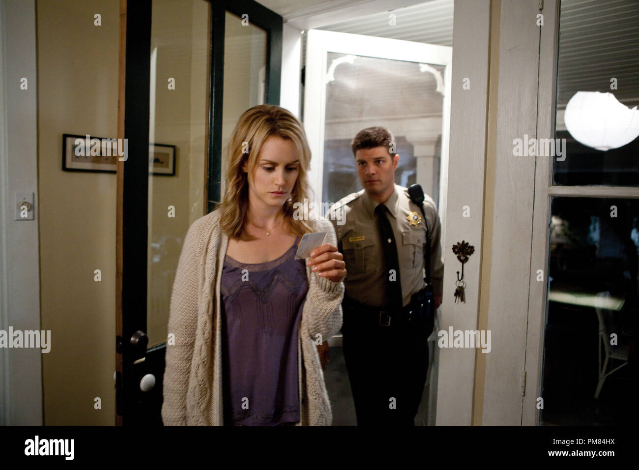 TAYLOR SCHILLING as Beth and JAY R. FERGUSON as Keith Clayton in Warner ...