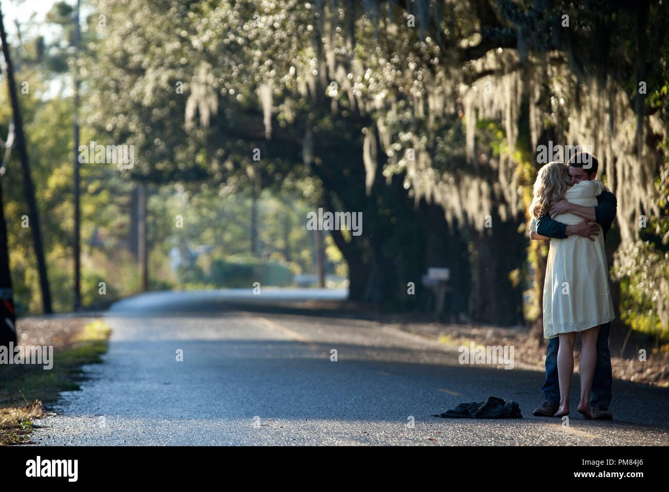 TAYLOR SCHILLING as Beth and ZAC EFRON as Logan in Warner Bros ...