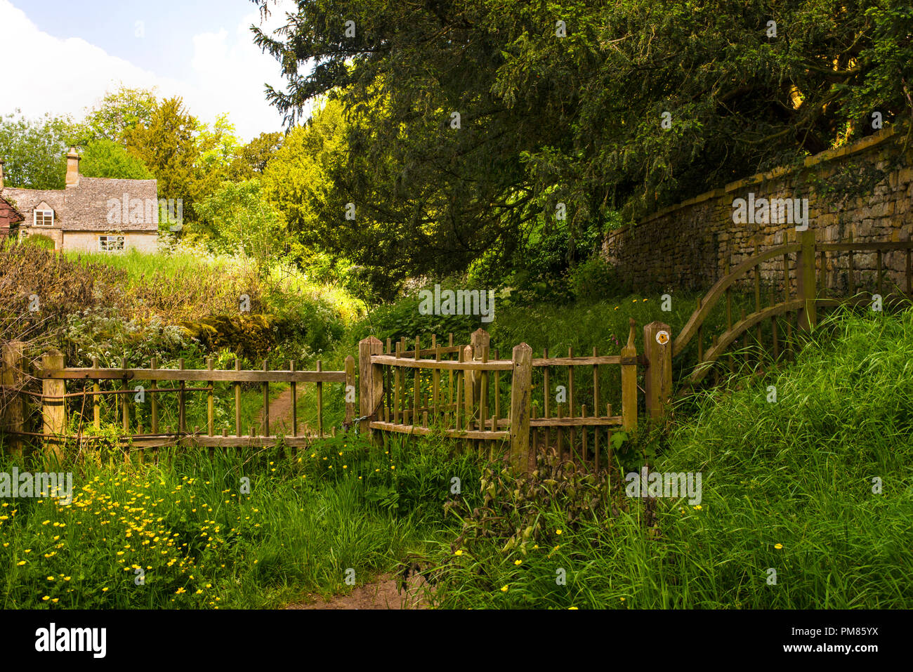 Kissing gate in the Cotswold District of England on the public footpath ...