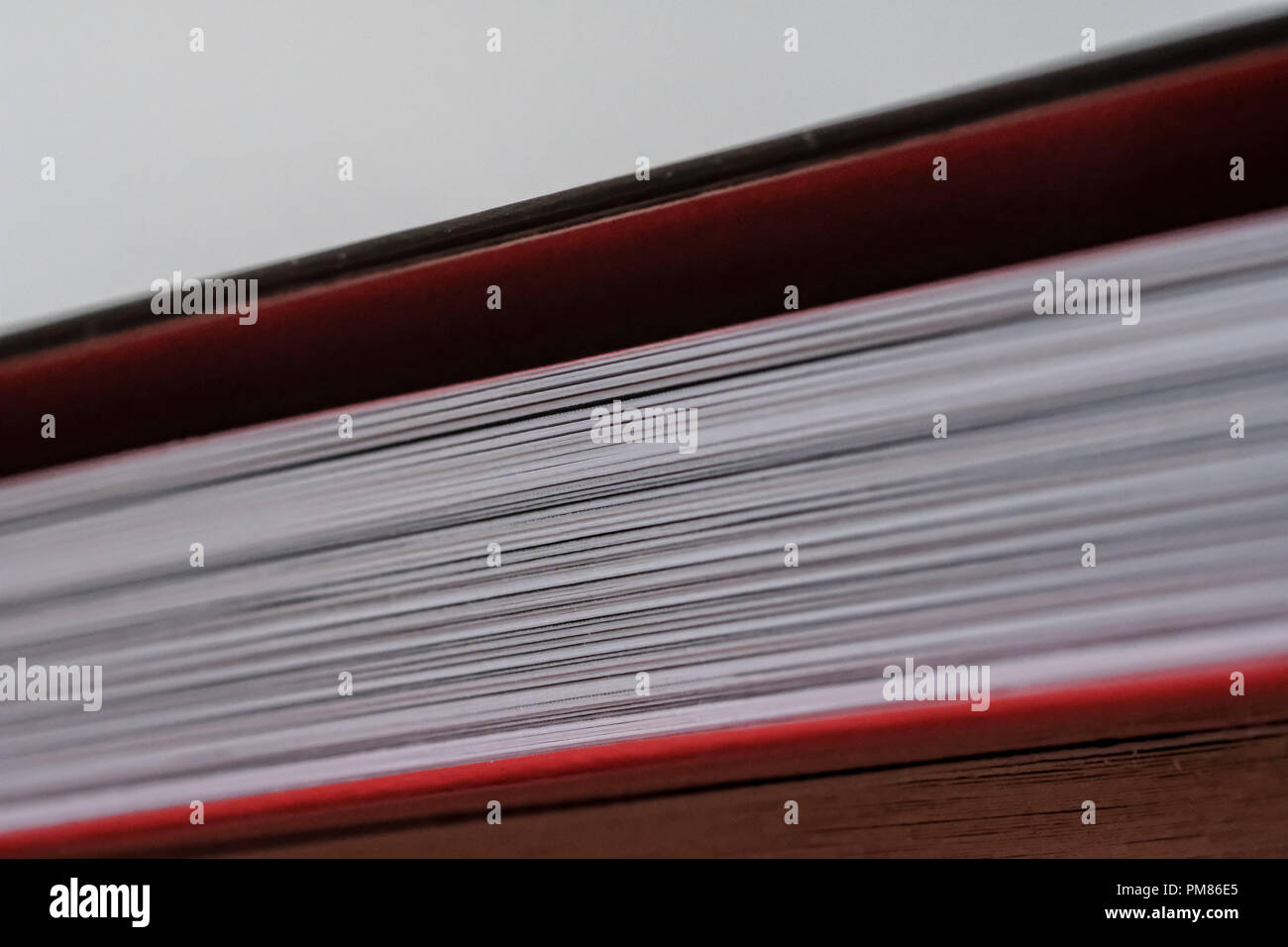 macro image of paper book pages up close. abstract image with bookmark ...
