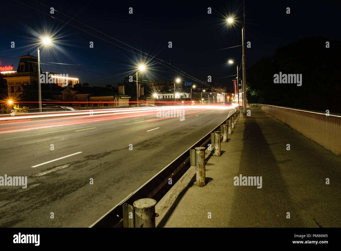 night traffic lights in Riga, Latvia. cars changing direction at night ...