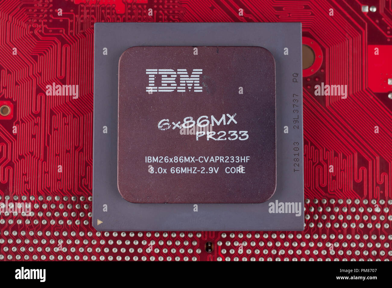 KYIV, UKRAINE - July 28, 2018. IBM 686MX PR233 processor on red circuit ...