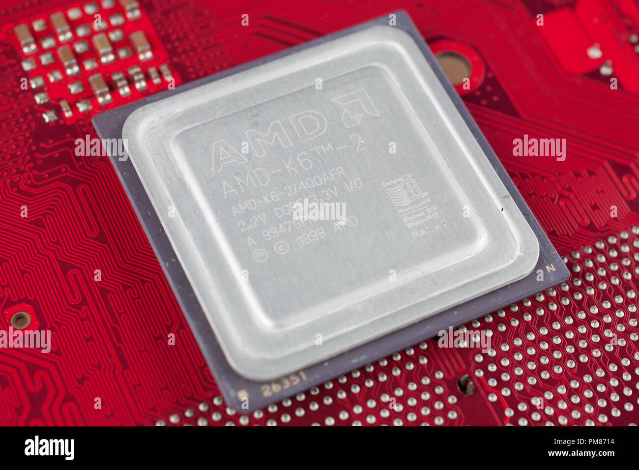 KYIV, UKRAINE - July 28, 2018. AMD K6 processor on red circuit board ...
