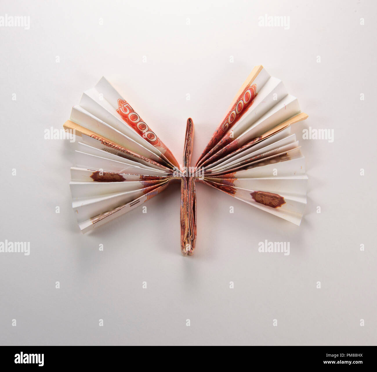 dollars in the form of butterflies Stock Photo - Alamy