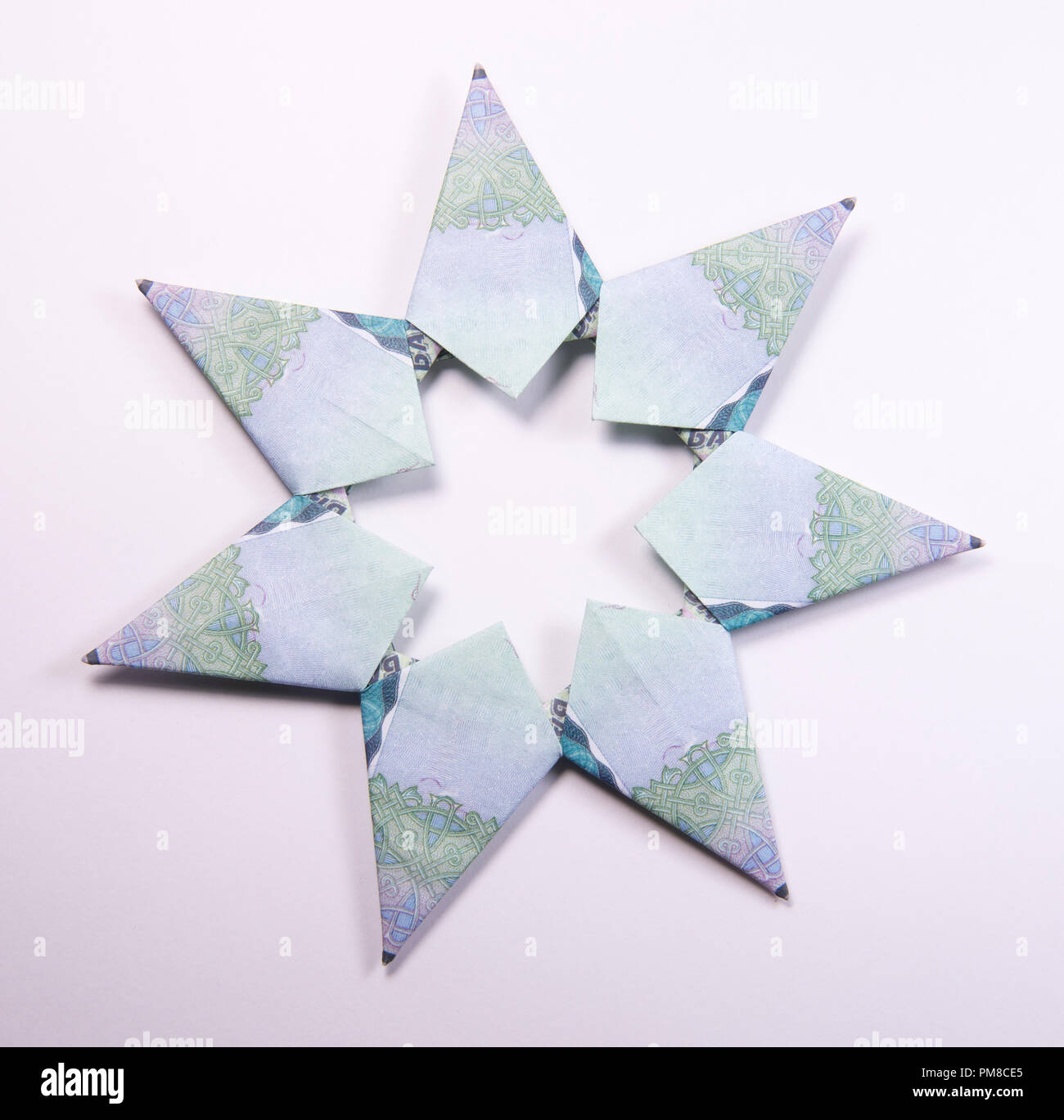Money Origami snowflake Stock Photo - Alamy
