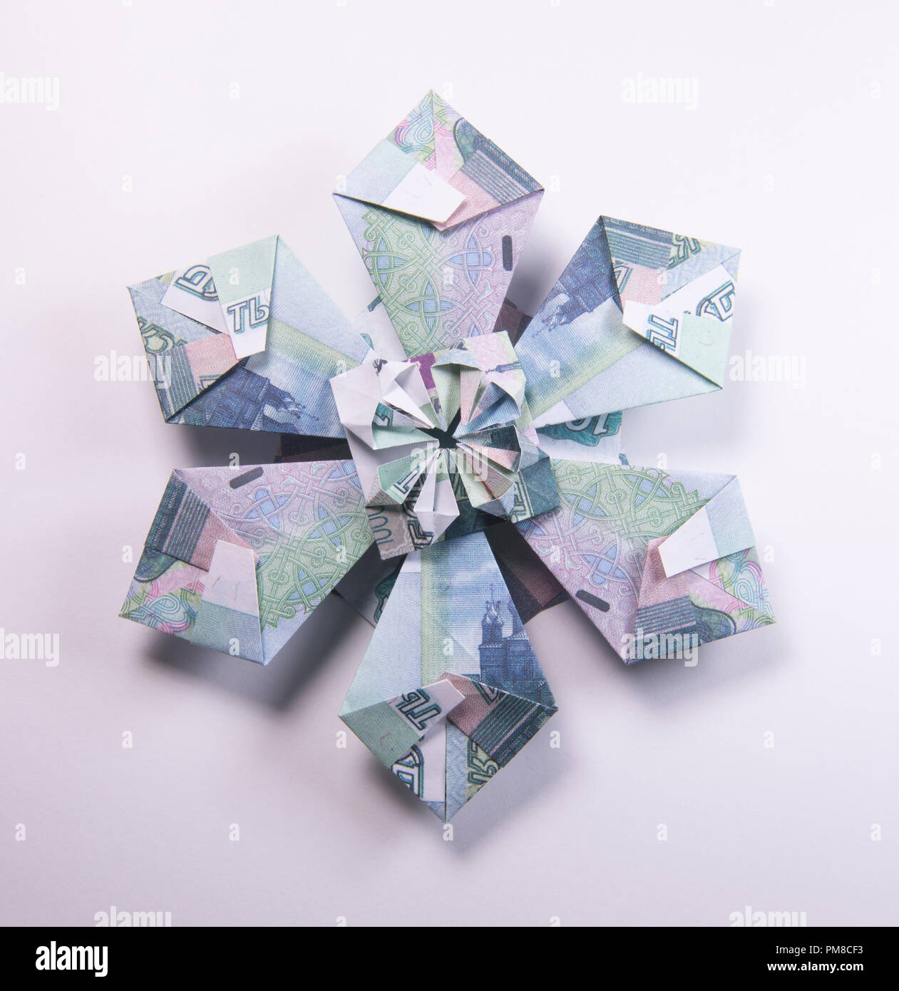 Money Origami snowflake Stock Photo - Alamy