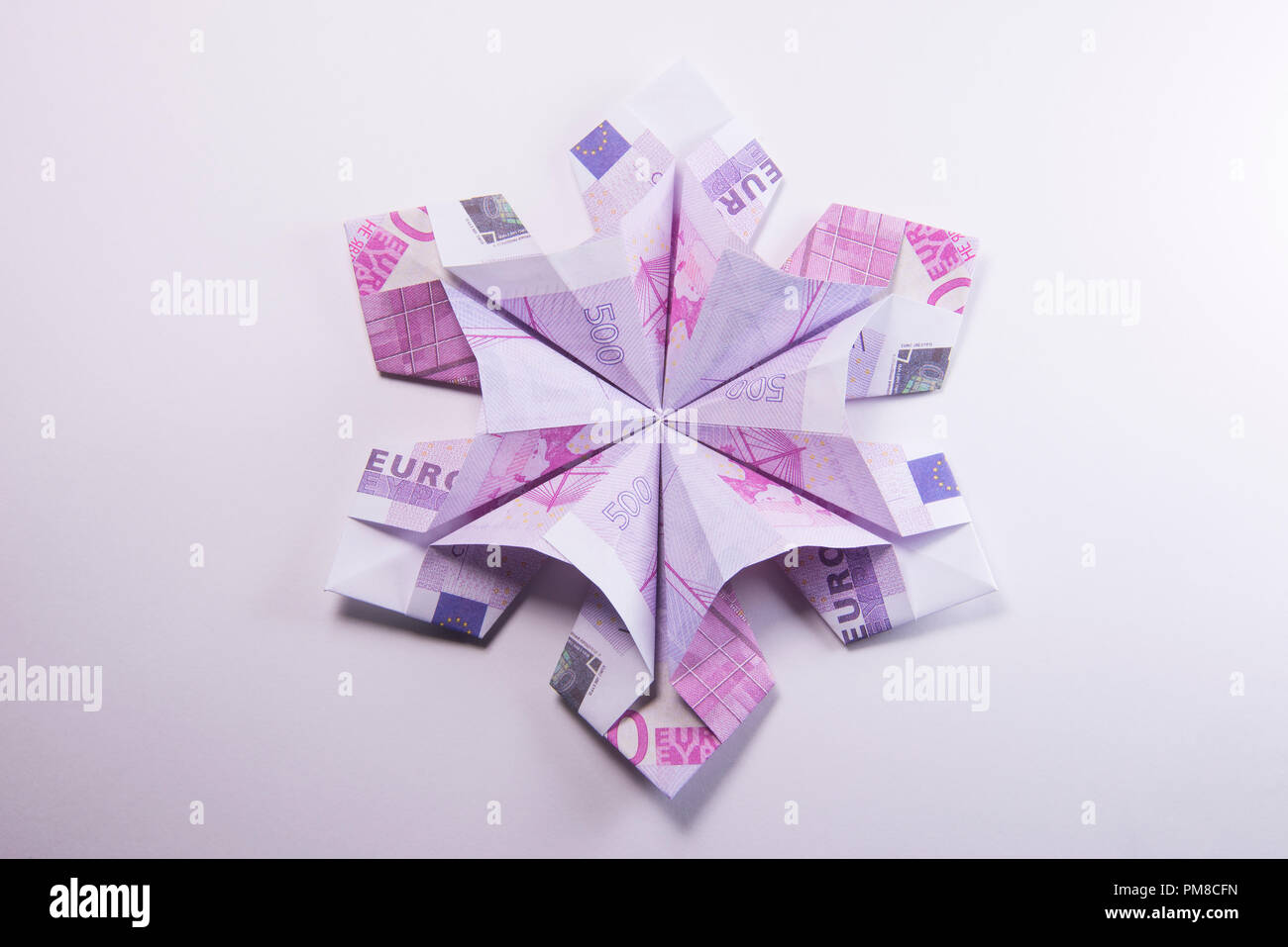Money Origami snowflake Stock Photo - Alamy