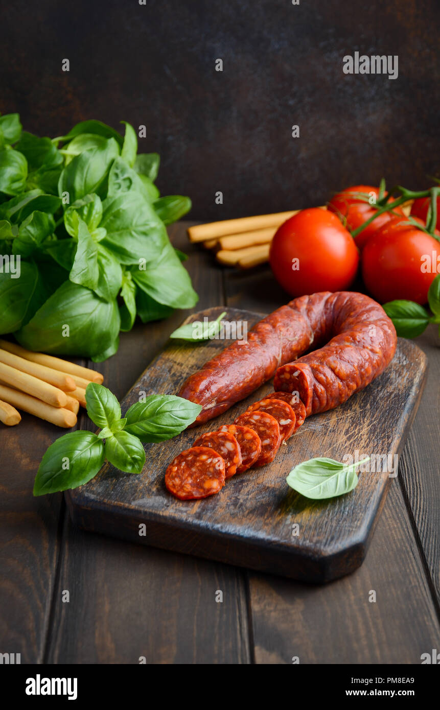 Chorizo sausage. Spanish traditional chorizo sausage with fresh herbs ...