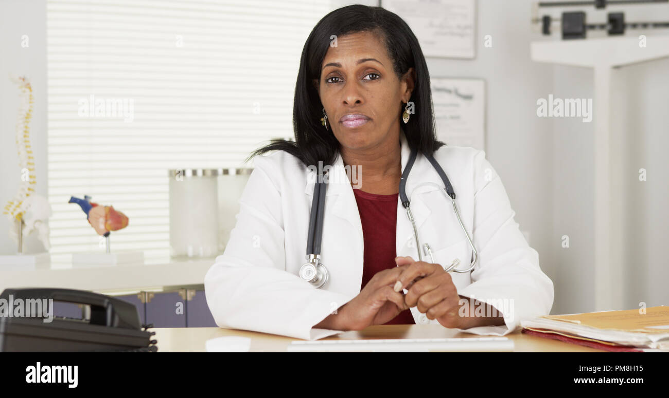 Black woman consulting doctor hi-res stock photography and images - Alamy