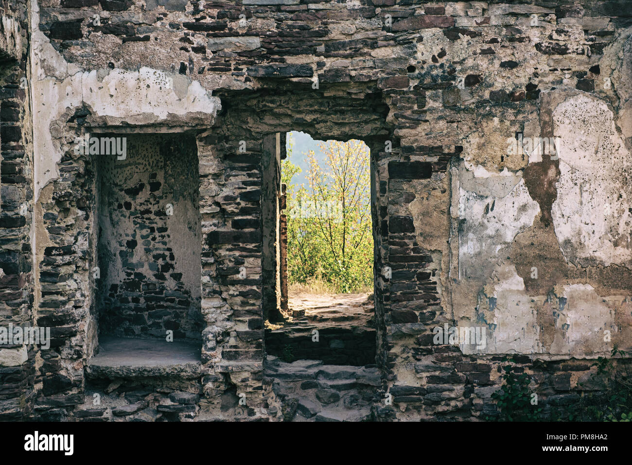 Old wall with breach Stock Photo - Alamy