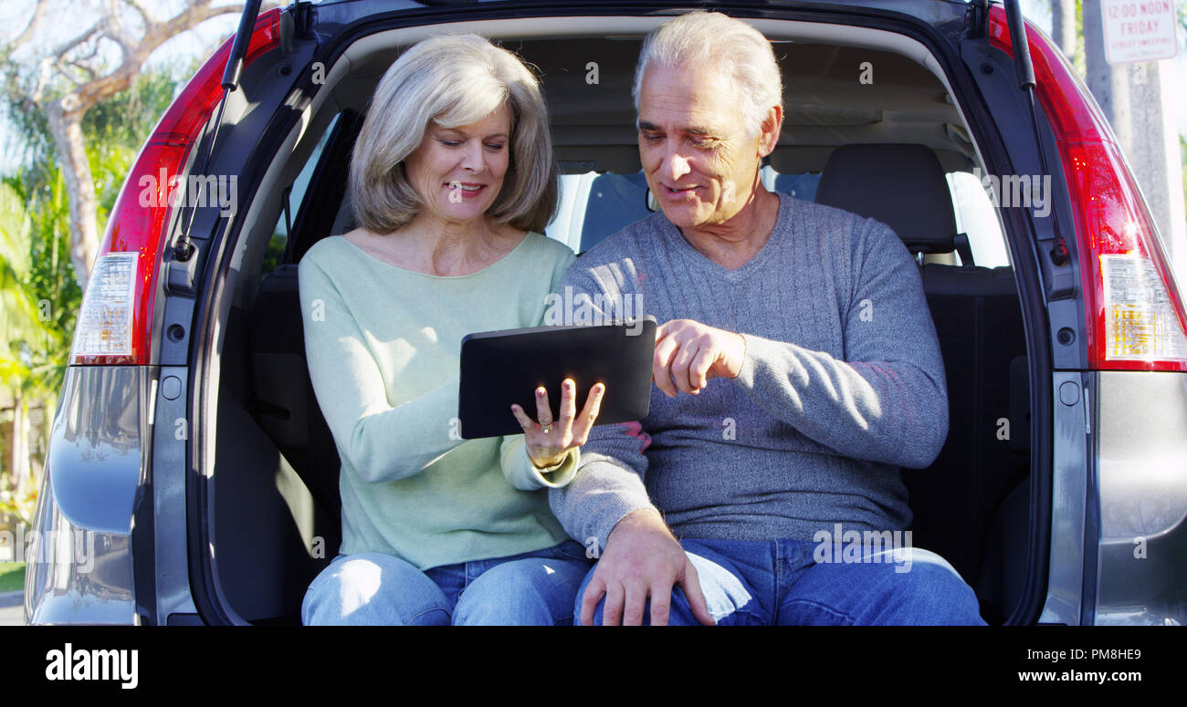 Couple deciding trip hi-res stock photography and images - Alamy