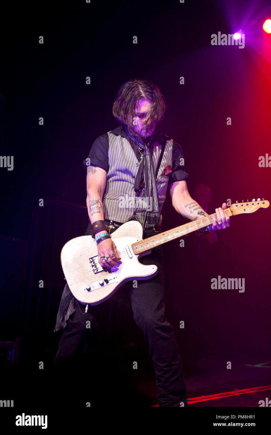 JOHNNY DEPP appears in concert at the premiere party for Warner Bros ...