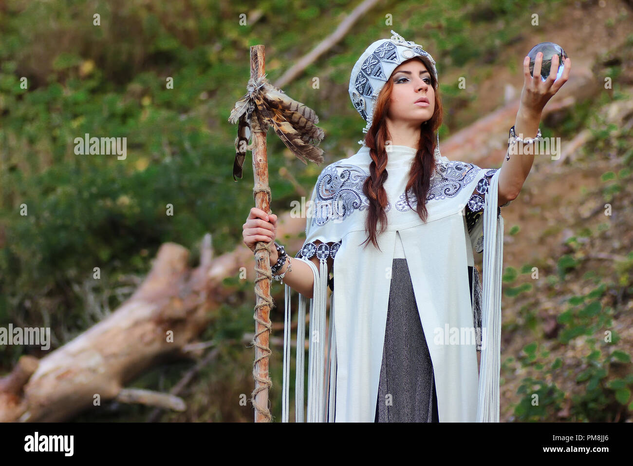Shaman with Staff and glass ball outdoor Stock Photo - Alamy