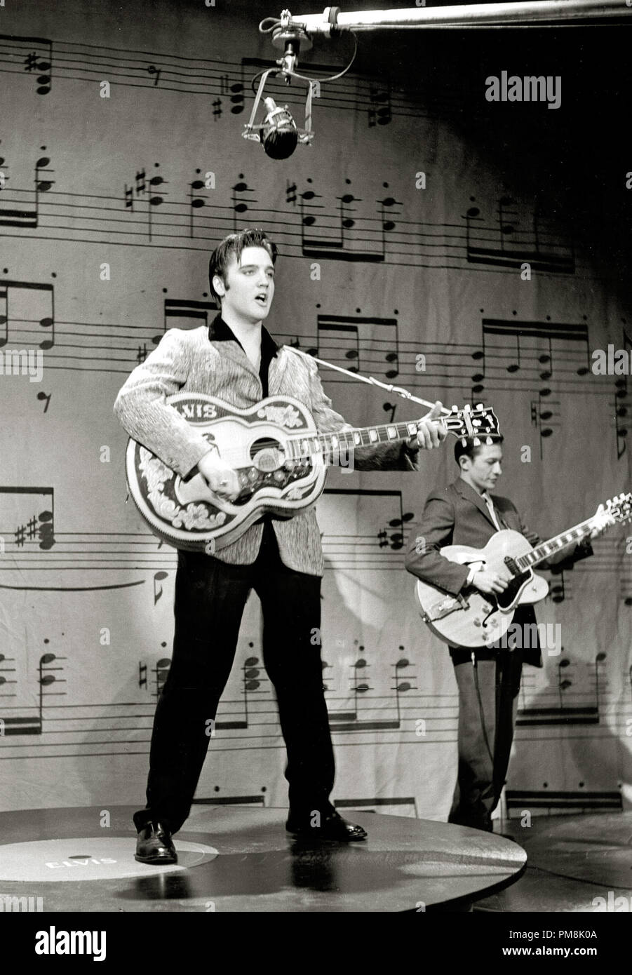 Elvis Presley Performing On Stage