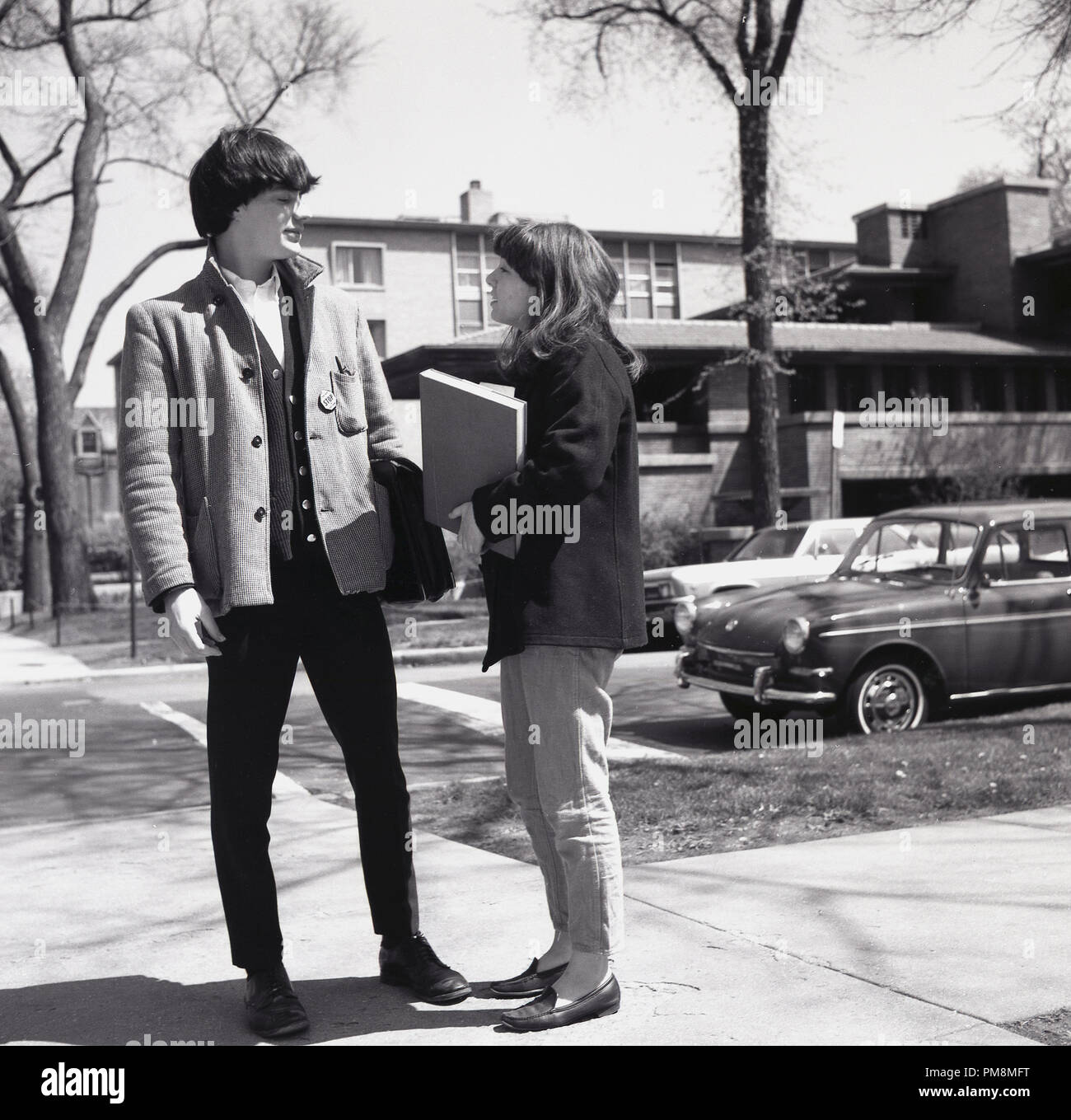 1960s, a male and female student from the university of chicago have a ...