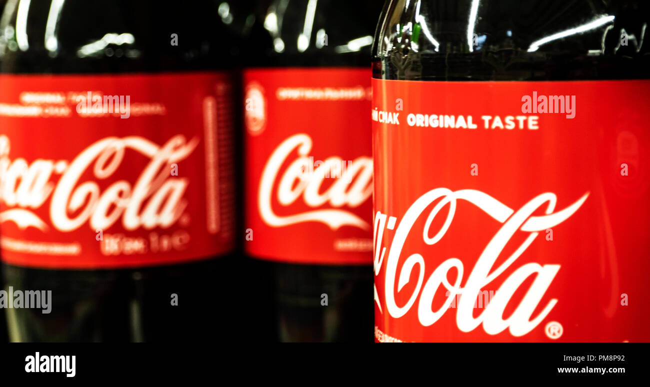 Row of Coca Cola bottles seen in store Stock Photo - Alamy