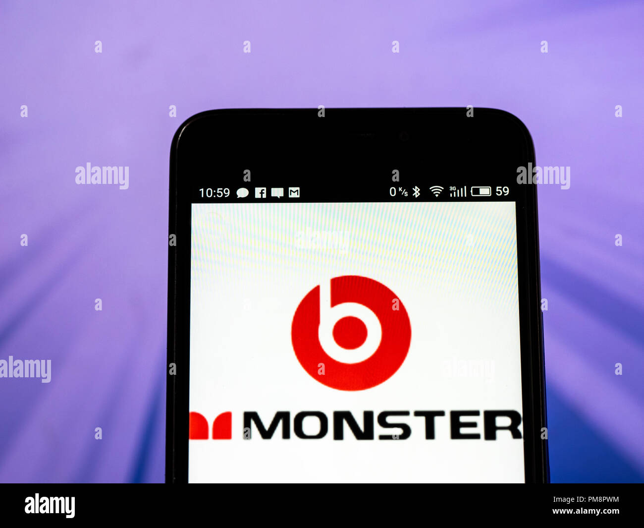 Beats Electronics LLC logo seen displayed on a smart phone Stock Photo ...