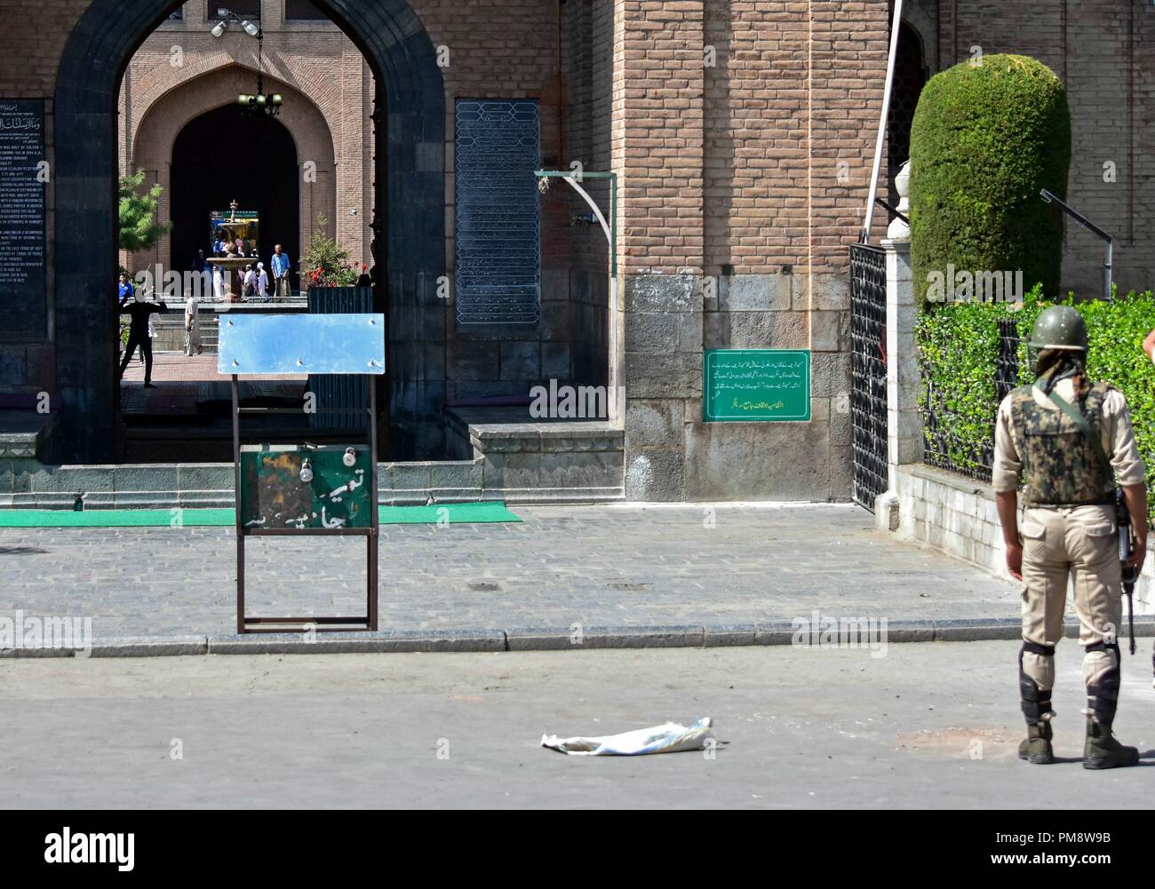 A police officer is seen on guard during the clashes. Clashes erupted ...