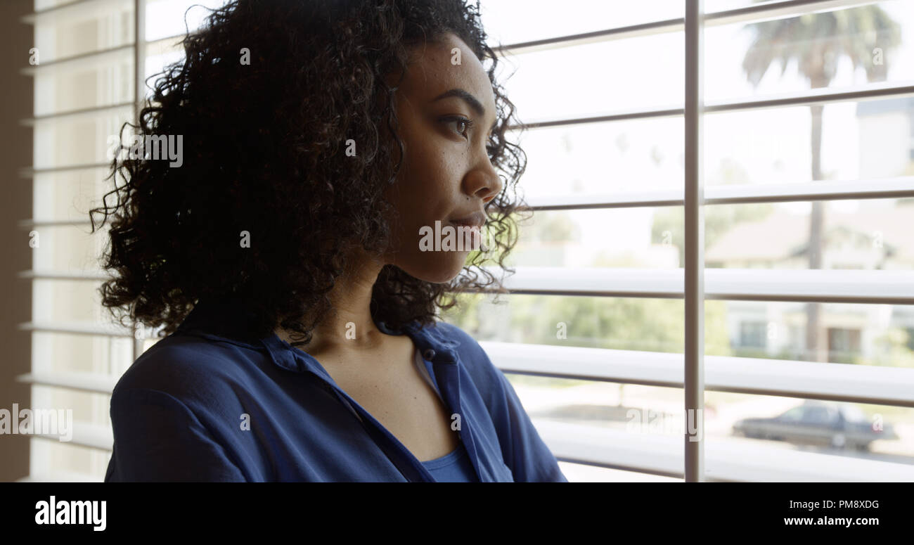 Profile of beautiful african woman reflecting Stock Photo - Alamy