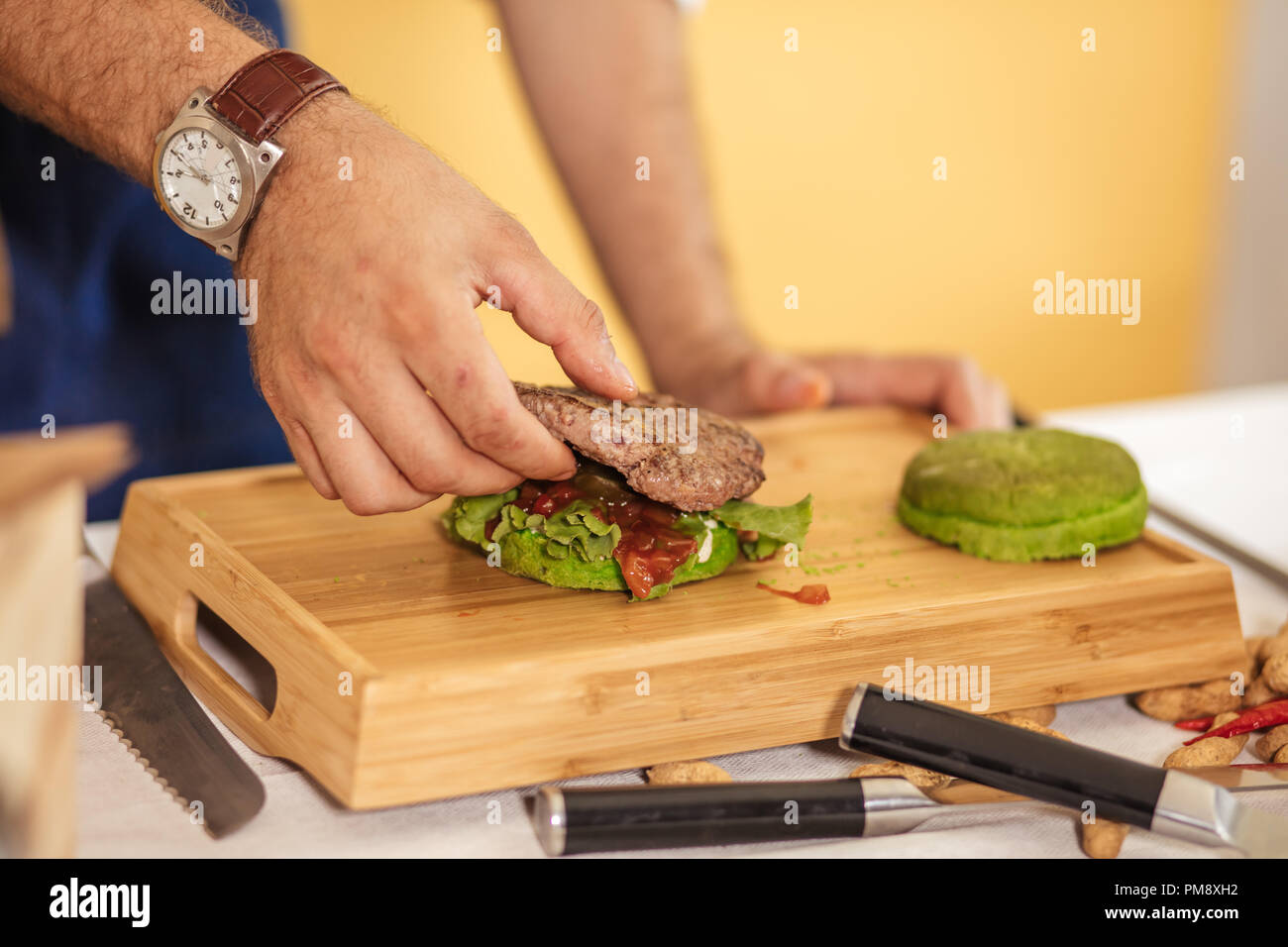 Culinary workshop, preparing delicious burgers Stock Photo - Alamy