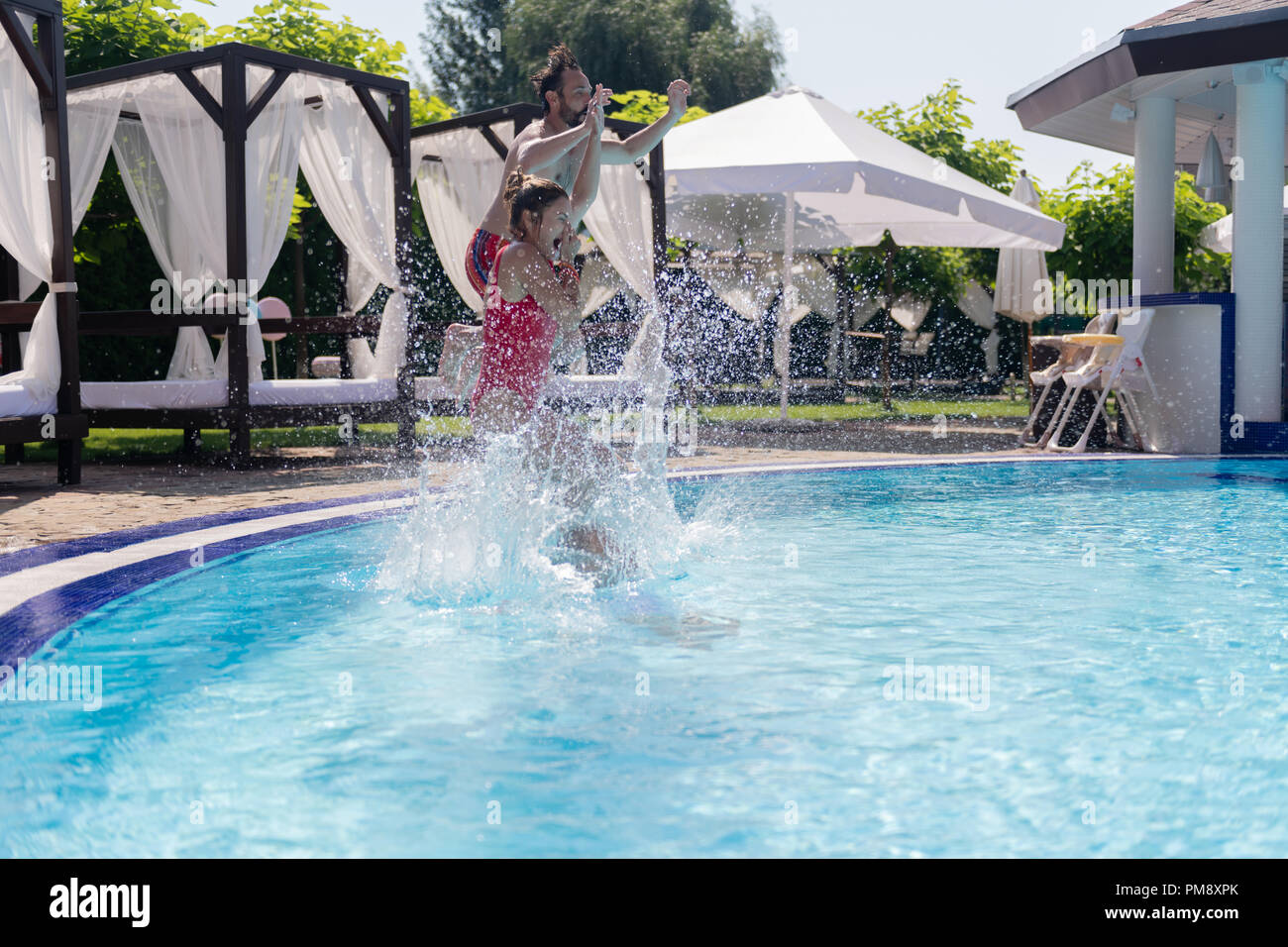 Mother Daughter Jumping Swimming Pool High Resolution Stock Photography ...