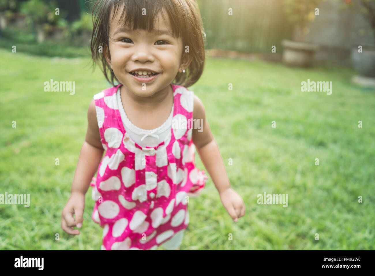 Childs joyful expression hi-res stock photography and images - Alamy