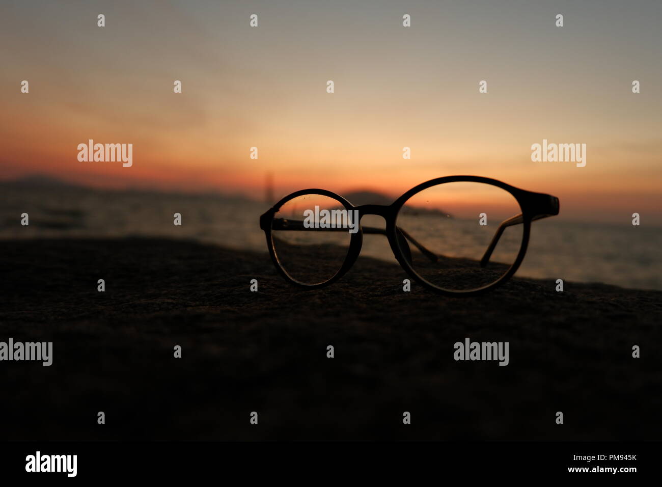 Sunset reflection glasses hi-res stock photography and images - Alamy
