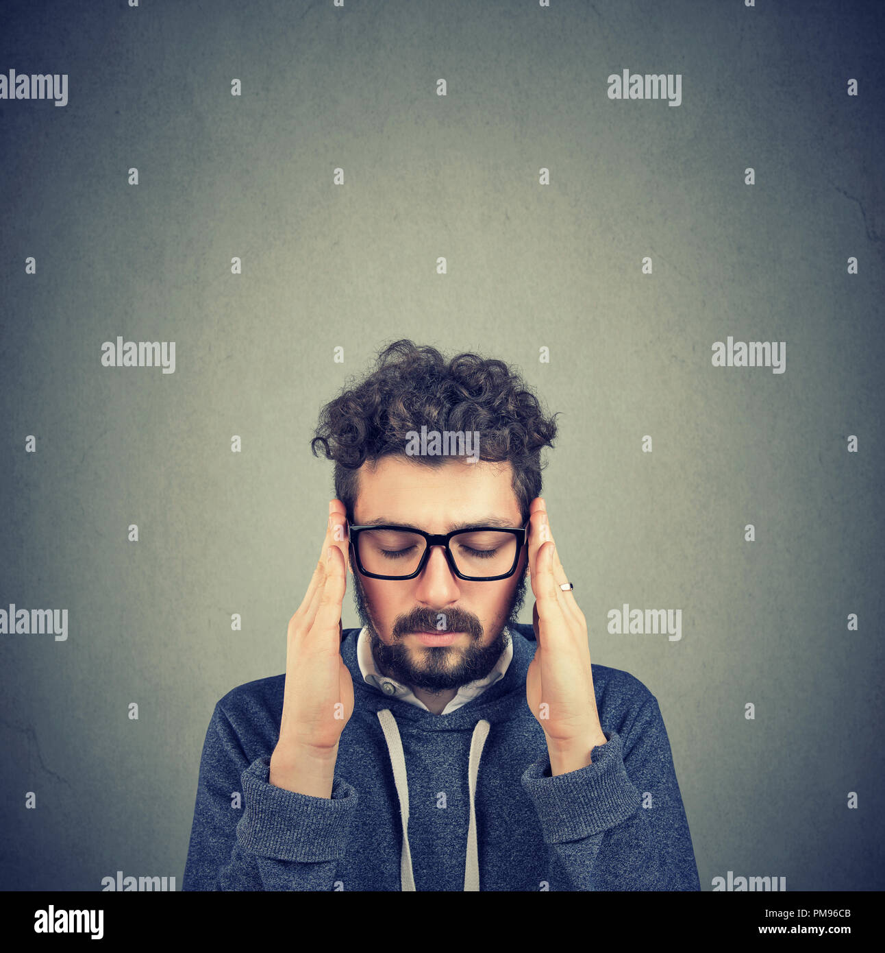 Closeup sad young man with worried stressed face expression. Obsessive ...