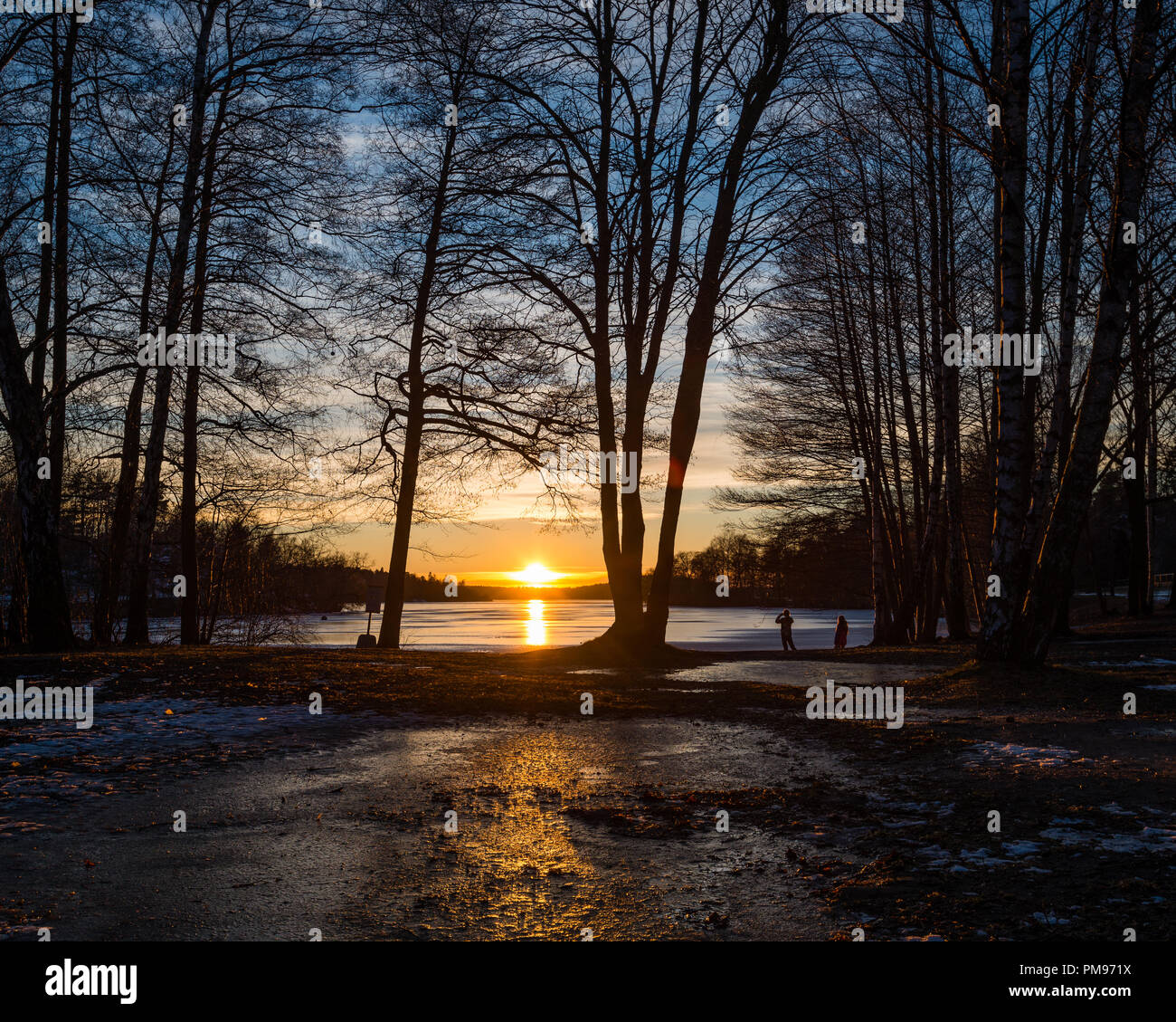 Watching over the frozen water hi-res stock photography and images - Alamy