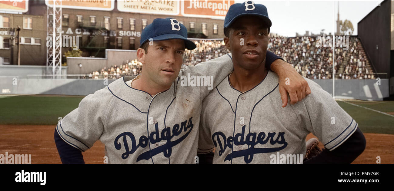 LUCAS BLACK as Pee Wee Reese and CHADWICK BOSEMAN as Jackie Robinson in ...