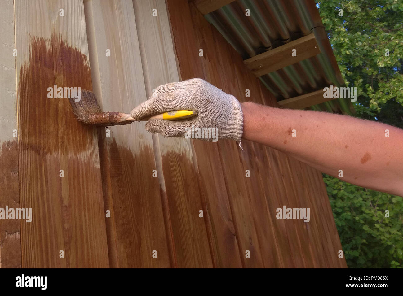 Hand-made brush for manual painting on a wooden wall 2018 Stock Photo ...