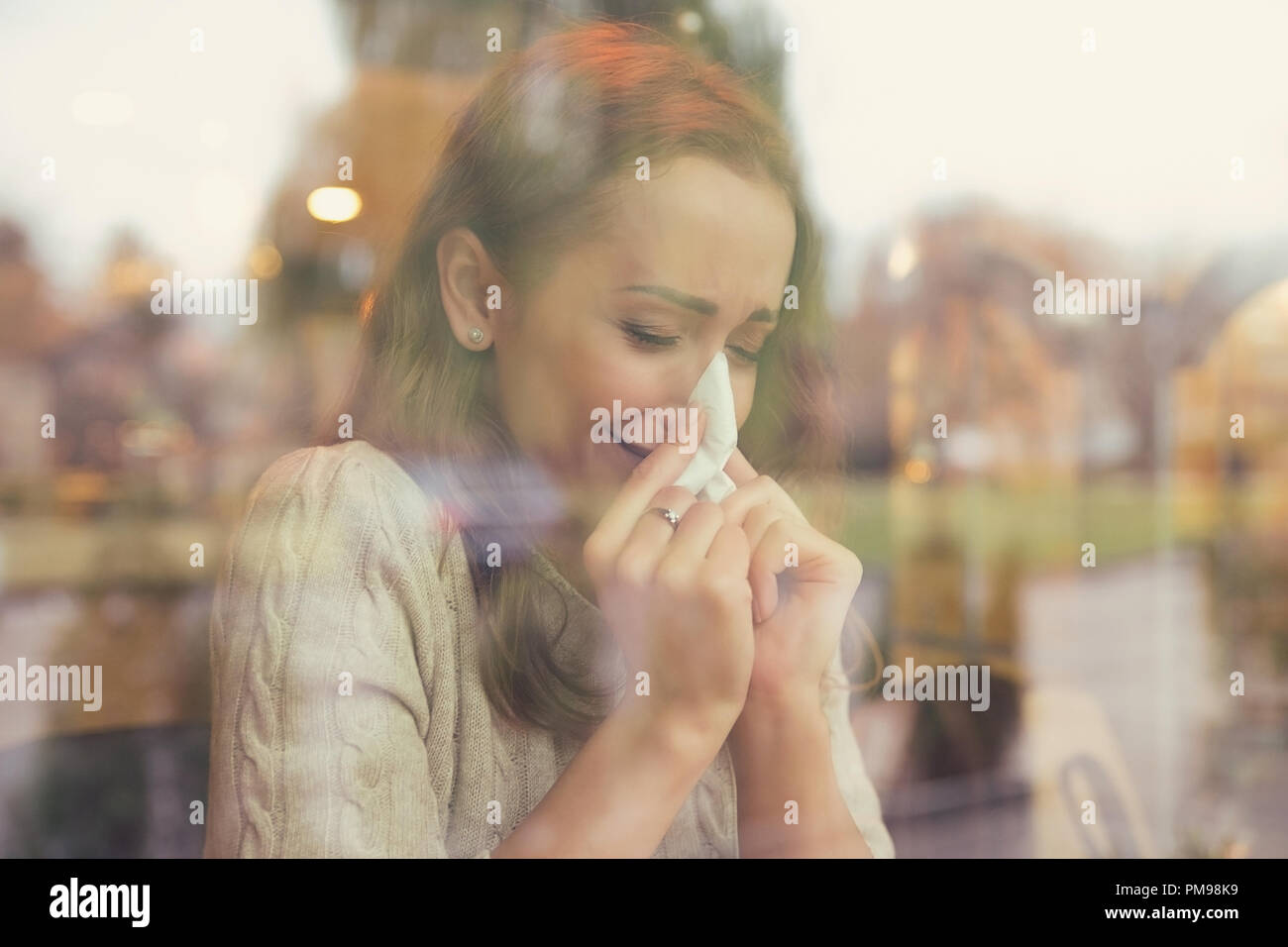 Asian girl blowing nose hi-res stock photography and images - Alamy