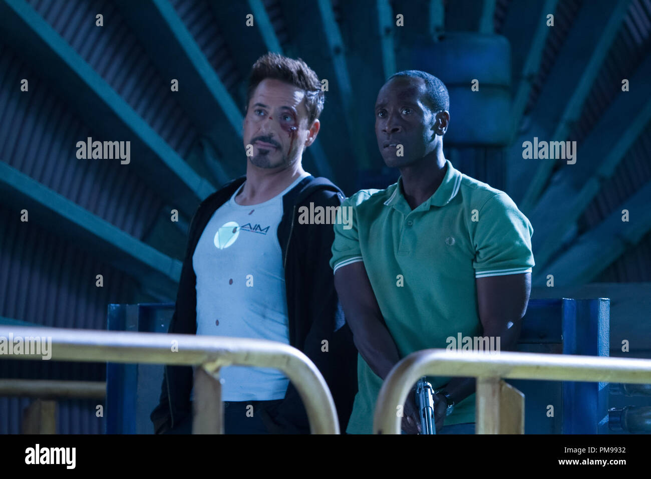 Don Cheadle and Robert Downey Jr. in "Iron Man 3 Stock Photo - Alamy
