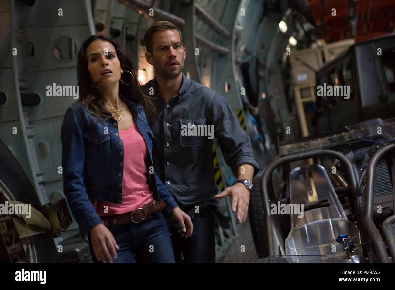 Mia (JORDANA BREWSTER) and Brian (PAUL WALKER) make a break for it in ...