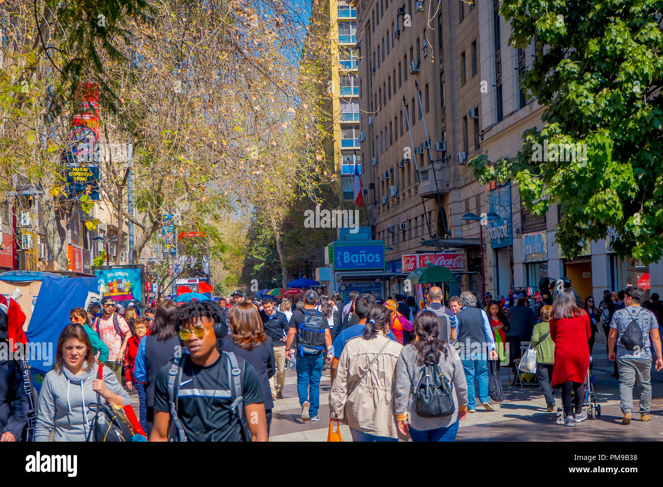 SANTIAGO, CHILE - SEPTEMBER 13, 2018: Crowd of people walking in the ...