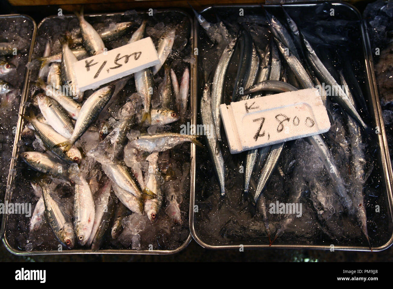 Tokyo, Japan. 21st Feb, 2006. Fresh fish await their buyers at at the ...