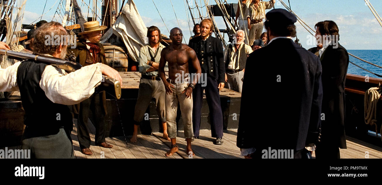 TOM HANKS (left background) as Dr. Henry Goose and DAVID GYASI (center ...