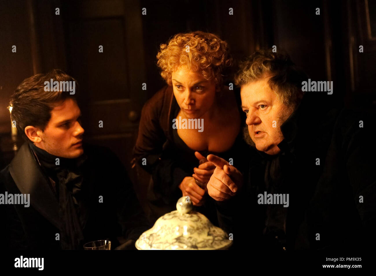 Jeremy Irvine stars as Pip and David Walliams stars as Uncle ...