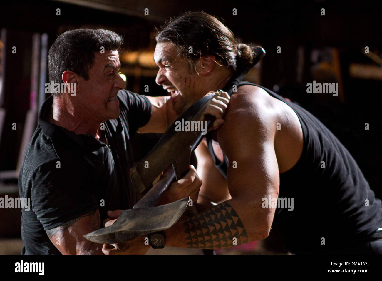(L-r) SYLVESTER STALLONE as Jimmy and JASON MOMOA as Keegan in Warner ...