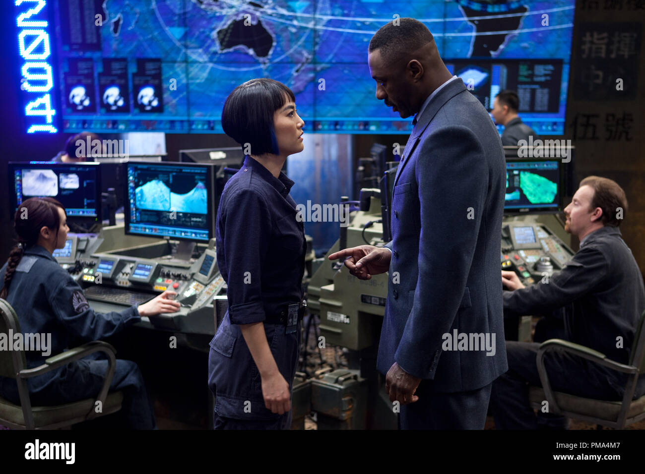 (L-r) RINKO KIKUCHI as Mako Mori and IDRIS ELBA as Stacker Pentecost in ...