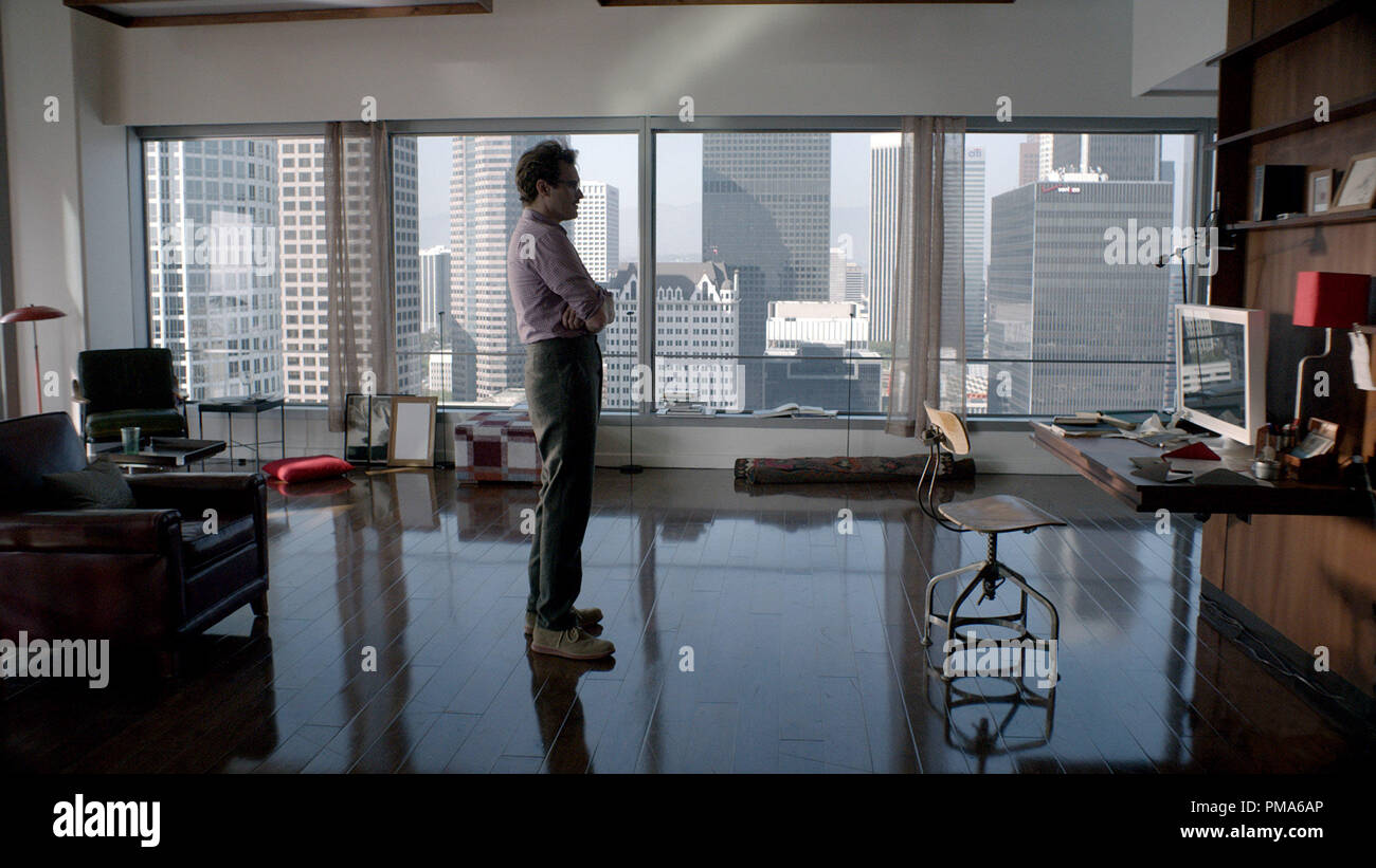 JOAQUIN PHOENIX as Theodore in the romantic drama "HER," directed by ...
