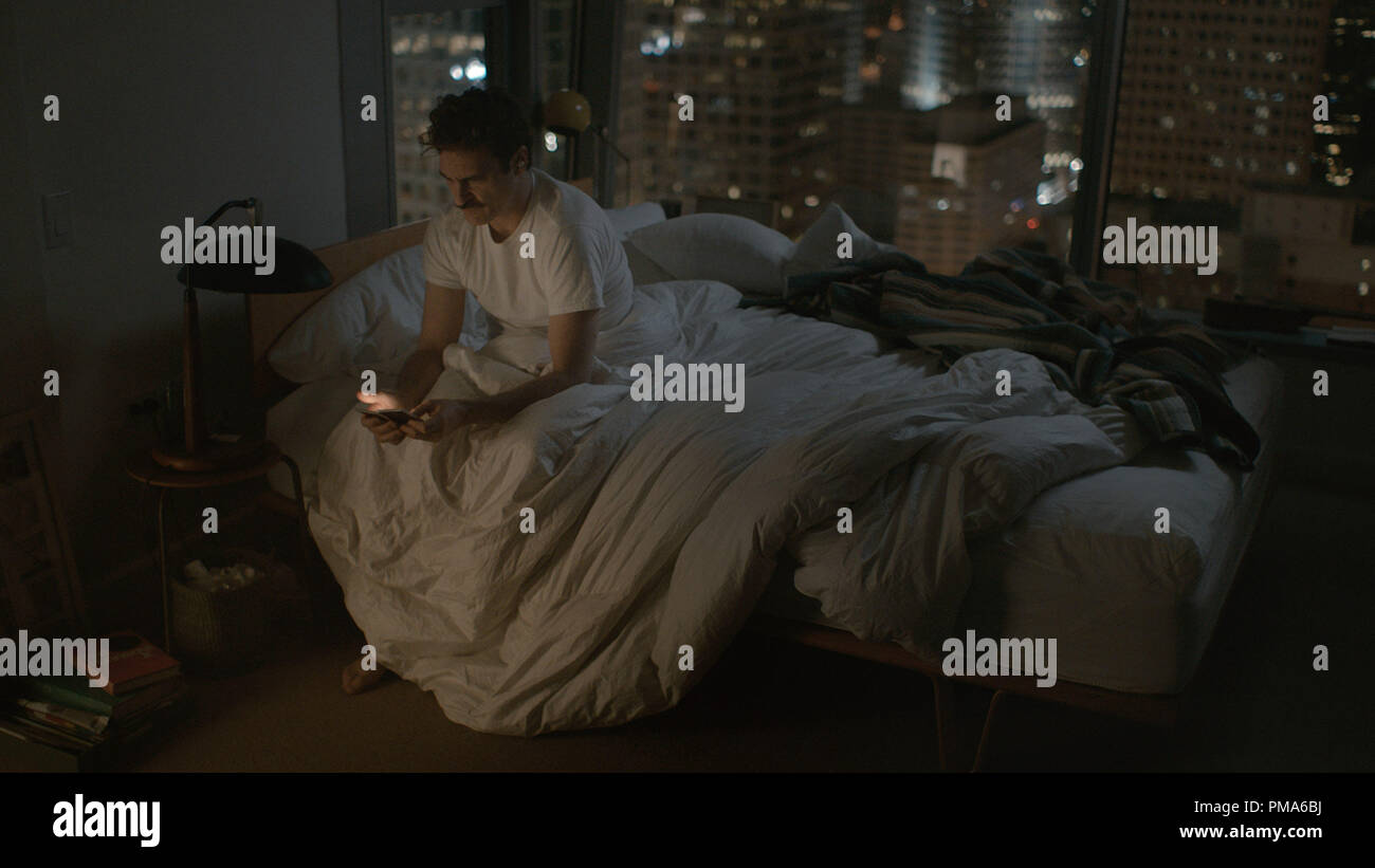 JOAQUIN PHOENIX as Theodore in the romantic drama "HER," directed by ...